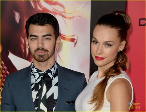 Joe Jonas And Blanda Eggenschwiler Catching Fire Premiere With Emily