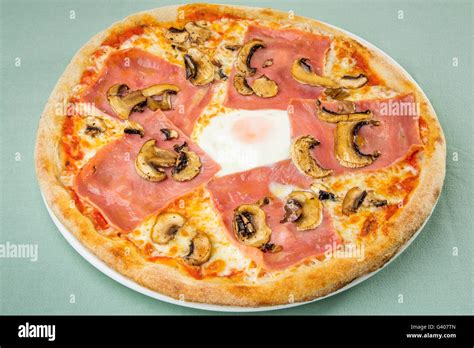 Capricciosa Italian Pizza With Mozzarella Ham Mushrooms And Egg Stock