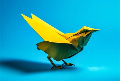 Premium Photo Origami Bird On Blue Background