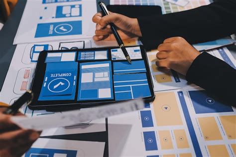 Premium Photo The Designer Team Is Designing The Uxui System To Make The Uxui System Work Well