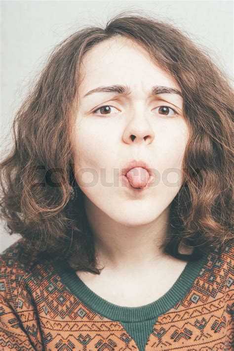 Girl Shows Tongue Stock Image Colourbox