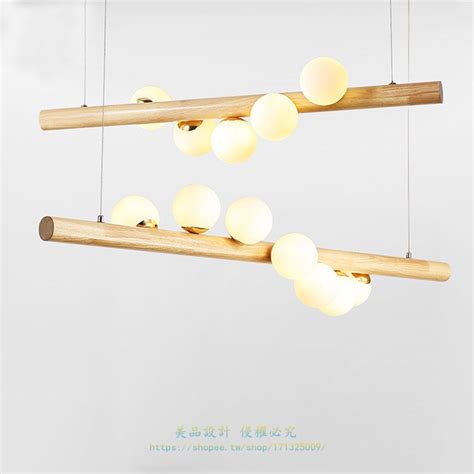 北歐 木紋鐵藝吊燈飯廳餐廳魔豆長條簡約燈具創意現代吊燈【美品匯gr】 蝦皮購物