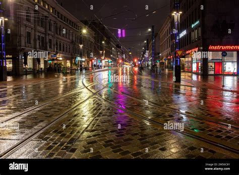 Lights Reflecting From Wet Hämeenkatu Sett Pavement Before Dawn In