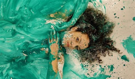 Portrait And Upper Body Of Young Naked Woman In Green Turquoise Color