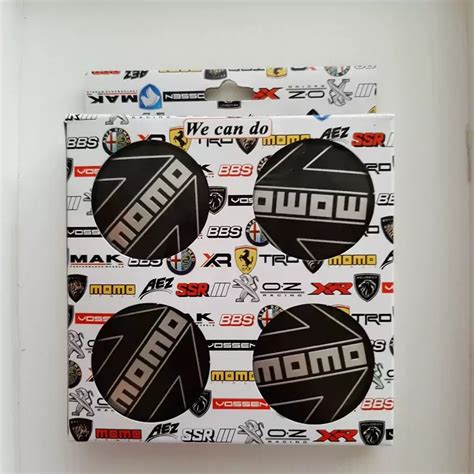 خرید و قیمت آرم و کاپ کامل چرخ ماشین طرحmomo فلش مشکی نوشته نقره ای