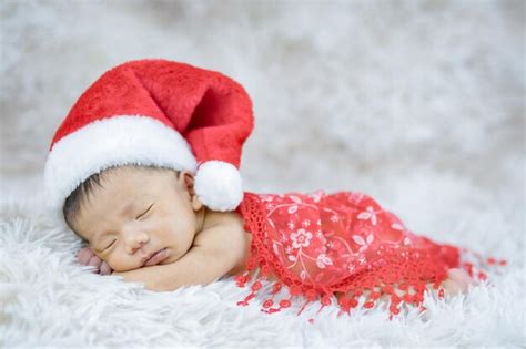 Premium Photo Baby Wearing Cute Red Dress And Santa Hat