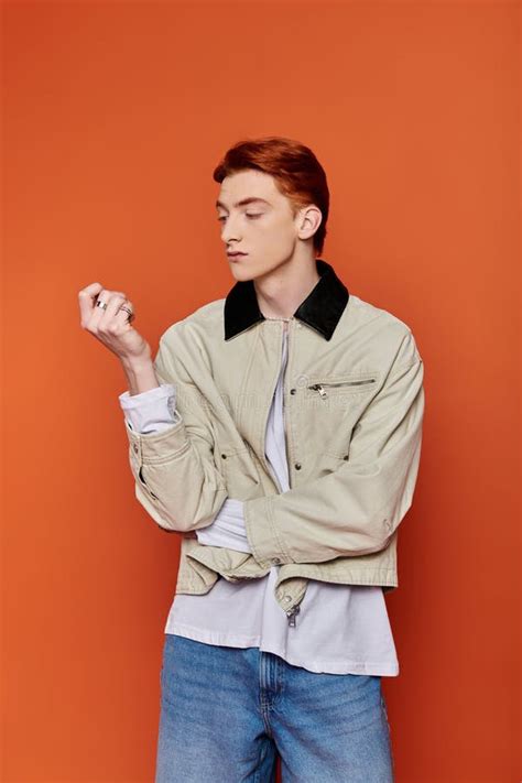 Emotional Young Man Poses Stylishly Against Stock Image Image Of