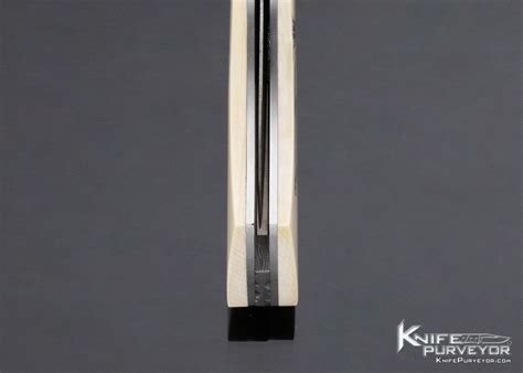 Doc Hagen Custom Knife Damascus And Scrimshawed Scale Release Automatic Knife Purveyor