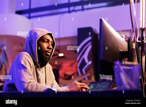 African American Criminal Hacking Online Server And Stealing Information Hacker In Hood