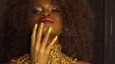 Surreal Fashion Portrait Of African American Female Model With Golden