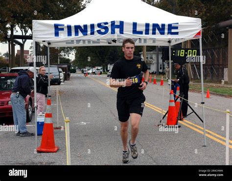 Us Navy Mass Communication Specialist 3rd Class Crosses The Finish Line