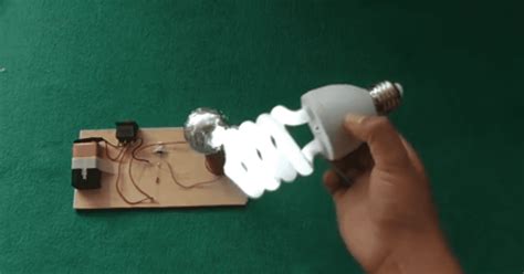Make Your Own Tesla Coil At Home That Will Light Up Bulbs In
