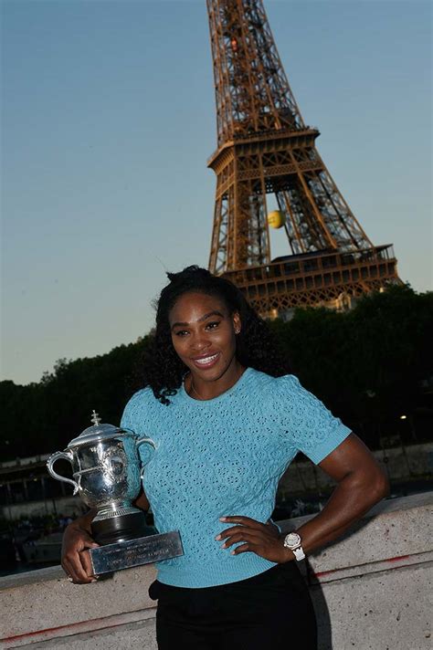 With Eiffel Tower Behind Serena Williams Flaunts French Open Trophy