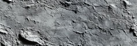 Textured Close Up Of Rough Gray Stone Surface Showing Natural Patterns