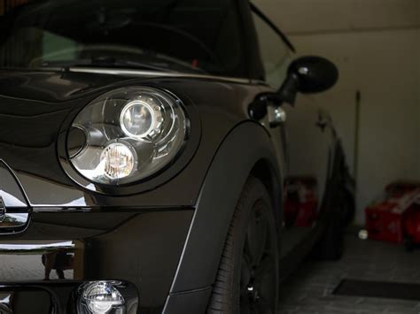 Premium Photo Black Car Parked In Garage