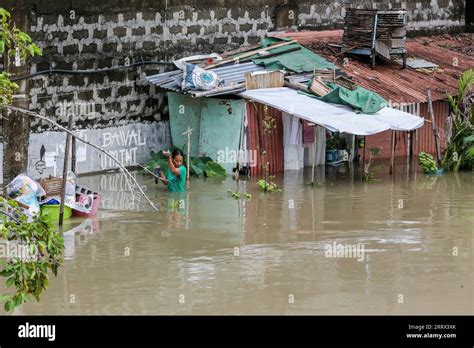 230819 Beijing Aug 19 2023 A Resident Wades Through Floodwater Triggered By Typhoon