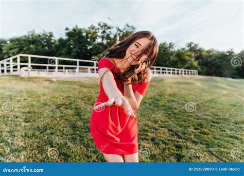 Fascinating Brown Haired Woman Enjoying Outdoor Photoshoot In Summer