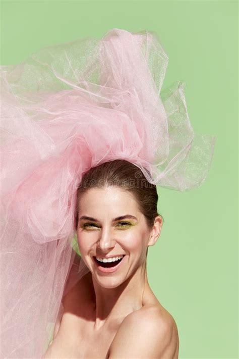 Shot Of Cheerful Beautiful Woman With Vivid Emotional Face Posing Over