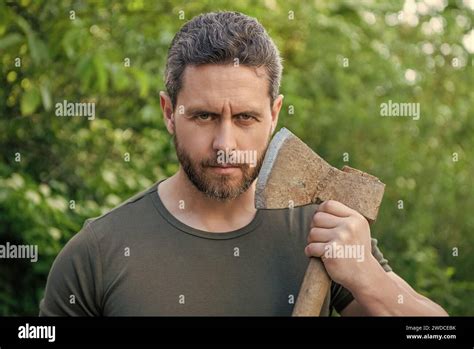 Face Of Masculine Guy With Axe Outdoor Photo Of Masculine Guy With Axe