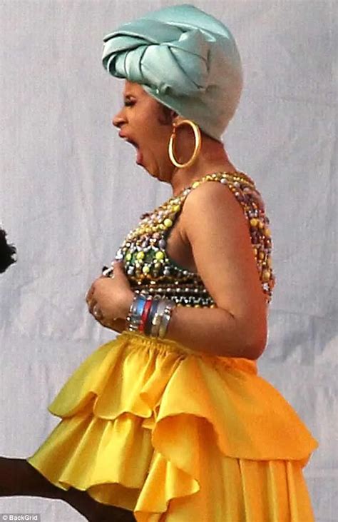 Cardi B Covers Her Stomach In Big Ruffles On Music Video Set Amid Rumors Of Pregnancy