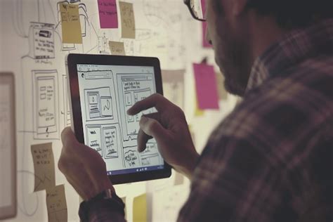 Uxui Designer Prototyping A Mobile Application Premium Ai Generated Image