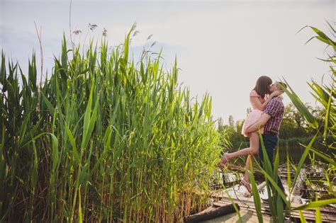 Premium Photo Lovers In A Lake Young Couple In Love Sitting On The