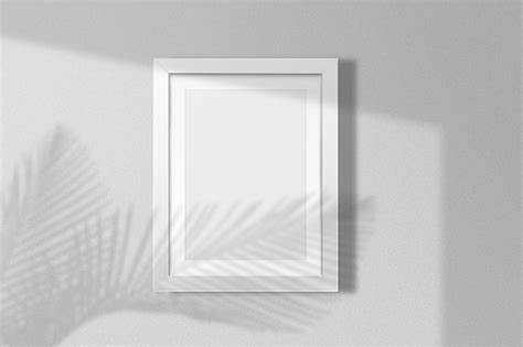 빈 공간 인물 사진 프레임은 흰색의 사실적인 직사각형 회색 프레임 모형에 격리되어 있습니다 디자인 그림 그림 포스터 글자 또는 그림자 오버레이가 있는 사진 갤러리를 위한 빈