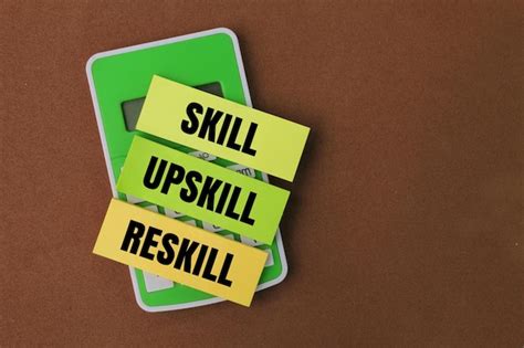 Premium Photo Colored Paper With The Words Skill Updkill And Reskill Skilling Upskilling And