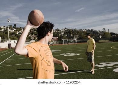 Person Throwing A Football