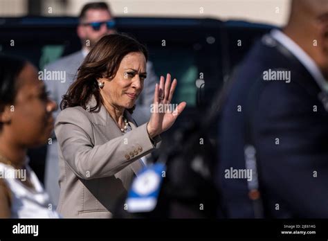 United States Vice President Kamala Harris Waves As She Walks Towards