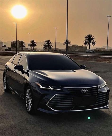 Black Car Parked In A Parking Lot