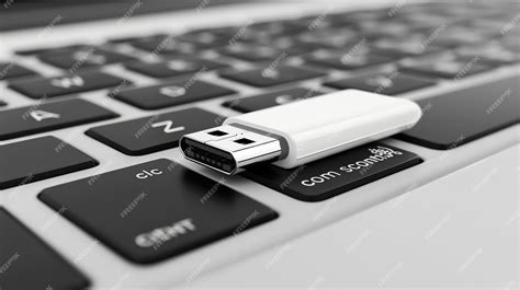 Premium Photo A White Usb Drive Plugged Into A Laptop Signifying Data
