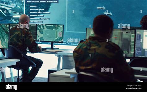 Group Of Soldiers Managing Air And Sea Traffic Control For Military