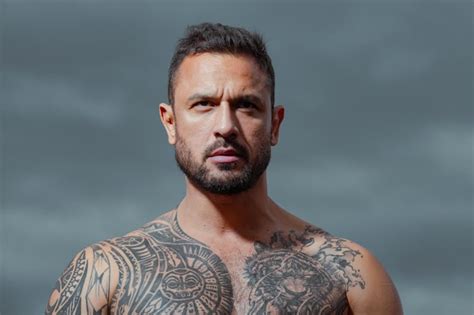 Premium Photo Seductive Face Of A Sexy Man Macho Looking Confident