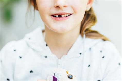 Premium Photo Midsection Of Girl With Gap Toothed