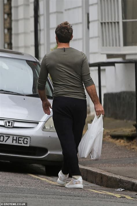 Jude Law Displays His Buff Body In Tight T Shirt To Buy Cheese Daily