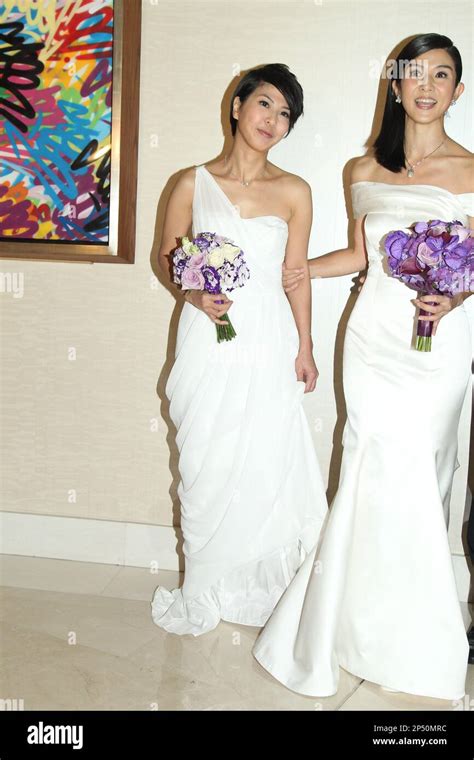 Charlie Yeung And Bridesmaid Valen Hsu Pose For Camera At Their Wedding