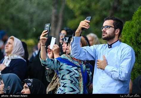 اهتزاز پرچم گنبد امام حسینع بر فراز مزار شهدای گمنامعکس تسنیم