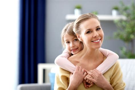 Premium Photo Beautiful Mom And Her Daughter Having Fun At Home