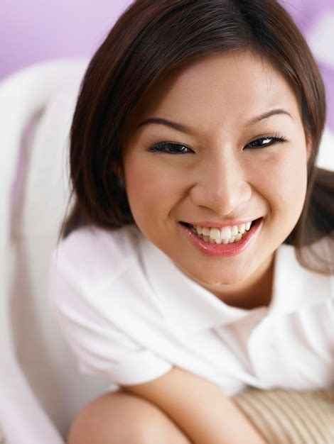 Premium Photo Close Up Portrait Of Smiling Woman At Home