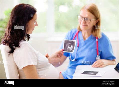 Doctor Examining Pregnant Woman Pregnancy Check Young Asian Female At