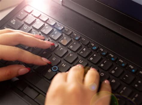 Premium Photo Woman Pressing Buttons On A Keyboard