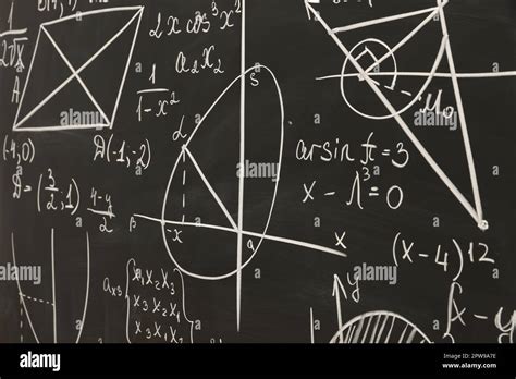 Different Mathematical Formulas Written With Chalk On Blackboard Stock