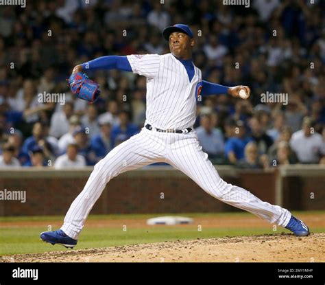 Chicago Cubs Relief Pitcher Aroldis Chapman Delivers During The Ninth