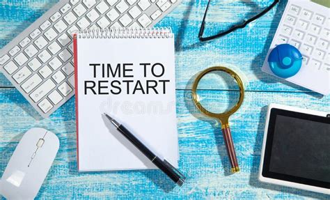 Time To Restart Message On Notepad With A Business Objects Stock Image Image Of Notepad