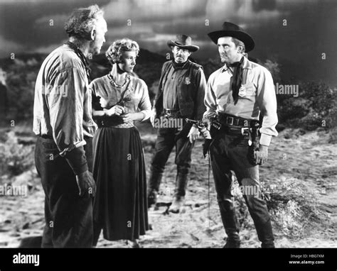 Along The Great Divide From Left Walter Brennan Virginia Mayo Ray