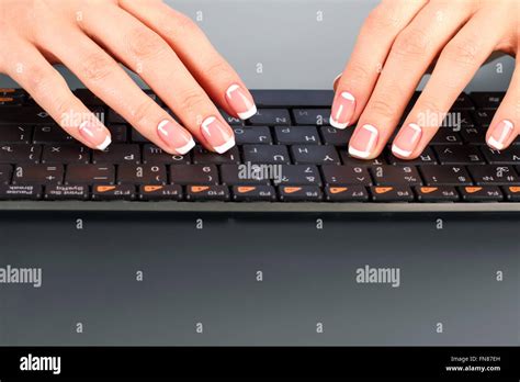 Woman S Fingers On Wireless Keyboard Stock Photo Alamy