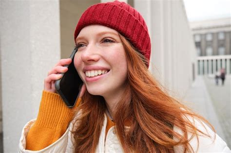 Free Photo Happy Redhead Woman Girl With Phone Talks Has Conversation
