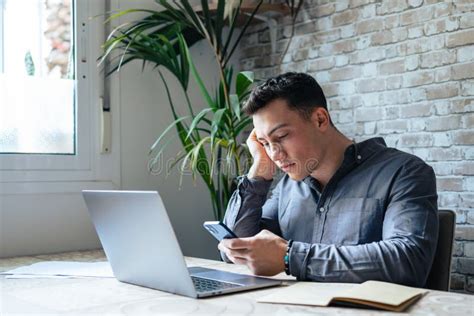 Unhappy Young Man Looking at Phone, Feeling Nervous of Bad Device Work, Internet Disconnection ...