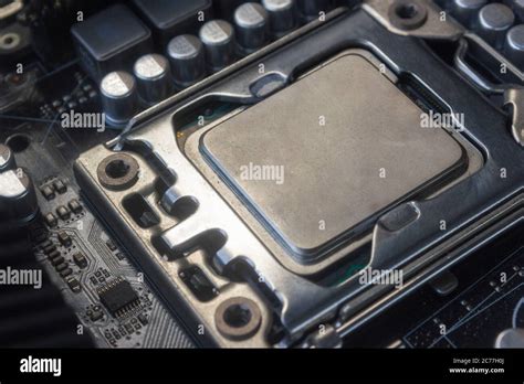 close up cpu socket on motherboard computer pc with cpu processor stock